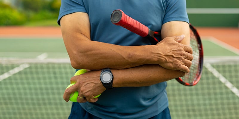 Was ist Tennisarm: Behandlung, Übung, Symptome